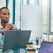 Corporate, black man and team in meeting, brainstorming and feedback ...