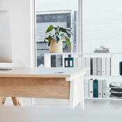 Empty office, interior and computer on desk in workplace, company or ...