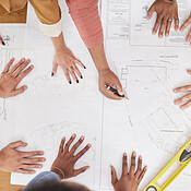 Blueprint, architecture and hands of people drawing for planning, floor ...