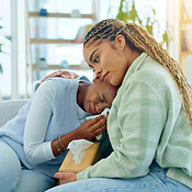 Sad black woman, friends and cry on sofa in support, care or ...