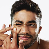 Pimple pop, Indian man and struggling model doing skincare and wellness ...