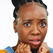 Face, fear and worried with a black woman in studio isolated on a white ...