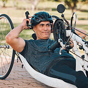 Sports, athlete or a man with a disability and bike for handicap race ...