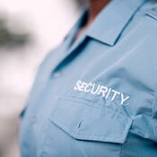 Uniform, security guard and in closeup for protection from crime with ...