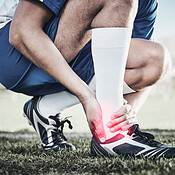 Injury, sports and hand of a man on foot pain, soccer emergency and ...