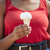 Hands, woman and vanilla ice cream for dessert, cool snack and sweet ...