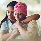 Love, sweet and woman with her mom with cancer hugging, bonding and ...