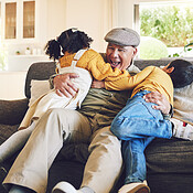 Hug, grandfather playing or happy kids in family home on sofa with love ...