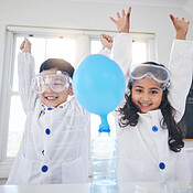 Portrait, children science and siblings in their home with a balloon ...