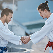 Men, karate and shaking hands at training fight with respect, fitness ...