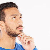 Thinking, face and mockup man focus on development ideas, planning or ...