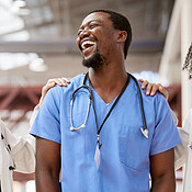 Doctors, healthcare and medical team laughing together in a hospital ...
