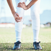 Knee pain, fitness and sports person with legs injury from baseball ...