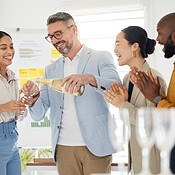 Success, champagne and applause with business people in office for ...