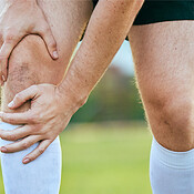 Knee pain, legs and sports person tired, fatigue and hurt from outdoor ...