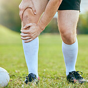 Knee pain, rugby legs and sports person tired, fatigue and sore ...