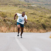 Outdoor, running and black man with fitness, cardio and training with ...