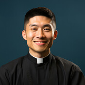 Portrait of asian priest smiling. Against backdrop. Religion concept ...