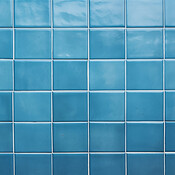 Blue ceramic tile wall or floor background. Design wallpaper copyspace ...