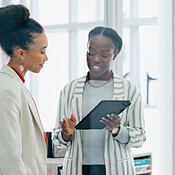 Business women, tablet and planning, support or advice in digital ...