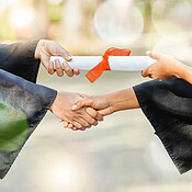 Graduation diploma, university and people shaking hands for learning ...