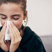 Woman, sick and couch with tissue, sickness and virus for infection ...