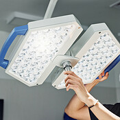 Assistant, surgery and nurse with surgical light for medical emergency ...