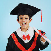 Graduate, child and celebration with portrait and happiness in studio ...
