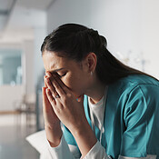 Stress, sad and loss with a woman nurse in hospital after a fail ...