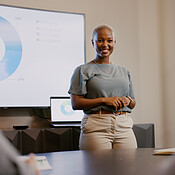 Business, black woman and infographic presentation on screen of data ...