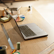 Laptop, ruler and design with color palette on desk for project ...