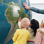 Science, world and students learning about the earth with a teacher at ...