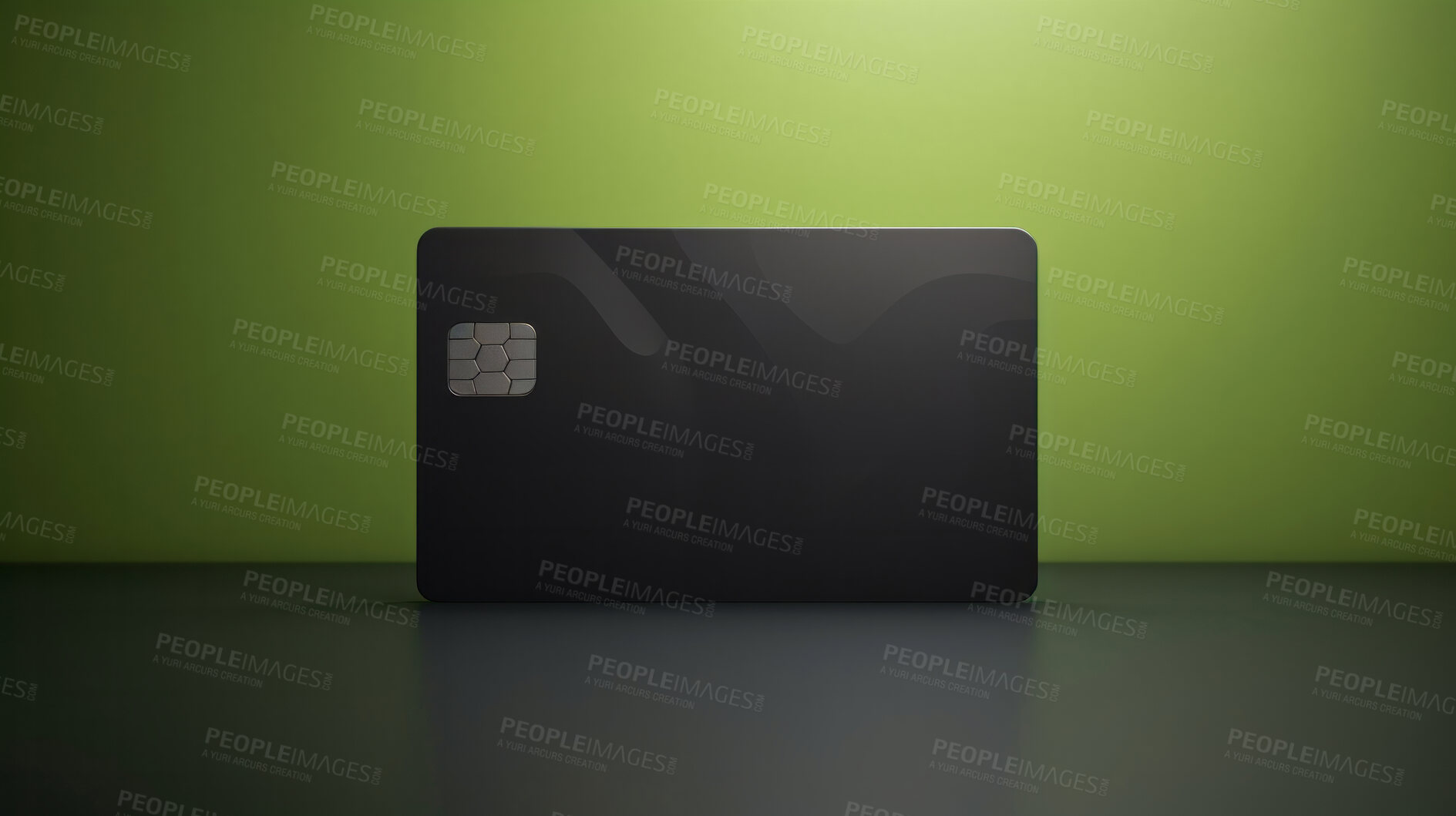Blank black bank card or gift voucher card on a green background ...
