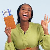 Black woman, passport and ok sign for studio portrait with airplane ...