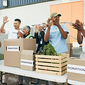 Volunteer, celebration and people with box for donation, charity drive ...