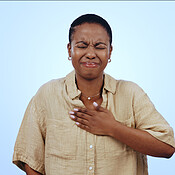Black woman, chest and sore throat in heart burn or cough isolated ...