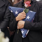 People Crying At A Military Funeral