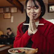 Restaurant, praying and Japanese woman with food for lunch, dinner and ...