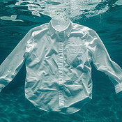 White shirt, water and laundry background for laundromat business ...