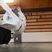 Aikido fight with sensei, wooden sword and student training for fitness ...