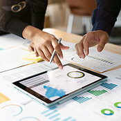 Business people, data analysis with tablet and documents, hands with ...