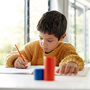 Student, drawing or child writing homework on notebook in kindergarten ...
