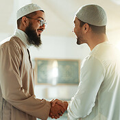 Muslim, handshake and people in mosque for greeting, conversation and ...