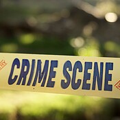 Police, yellow line and crime scene in outdoor for murder, homicide and ...