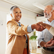 Business woman, handshake and applause deal with smile, negotiation and ...