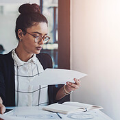 Processing paperwork like a pro | Buy Stock Photo on PeopleImages ...