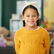 Smile, face and girl in classroom for education, learning and ready for ...