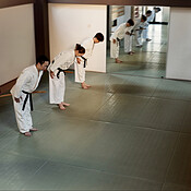 Japanese students, bow or learning martial arts in dojo for practice ...
