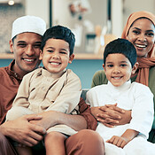 Muslim family, happy and portrait on sofa in home, together and smile ...