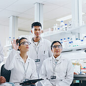 Meeting, research and group of scientists in laboratory with mentor for ...